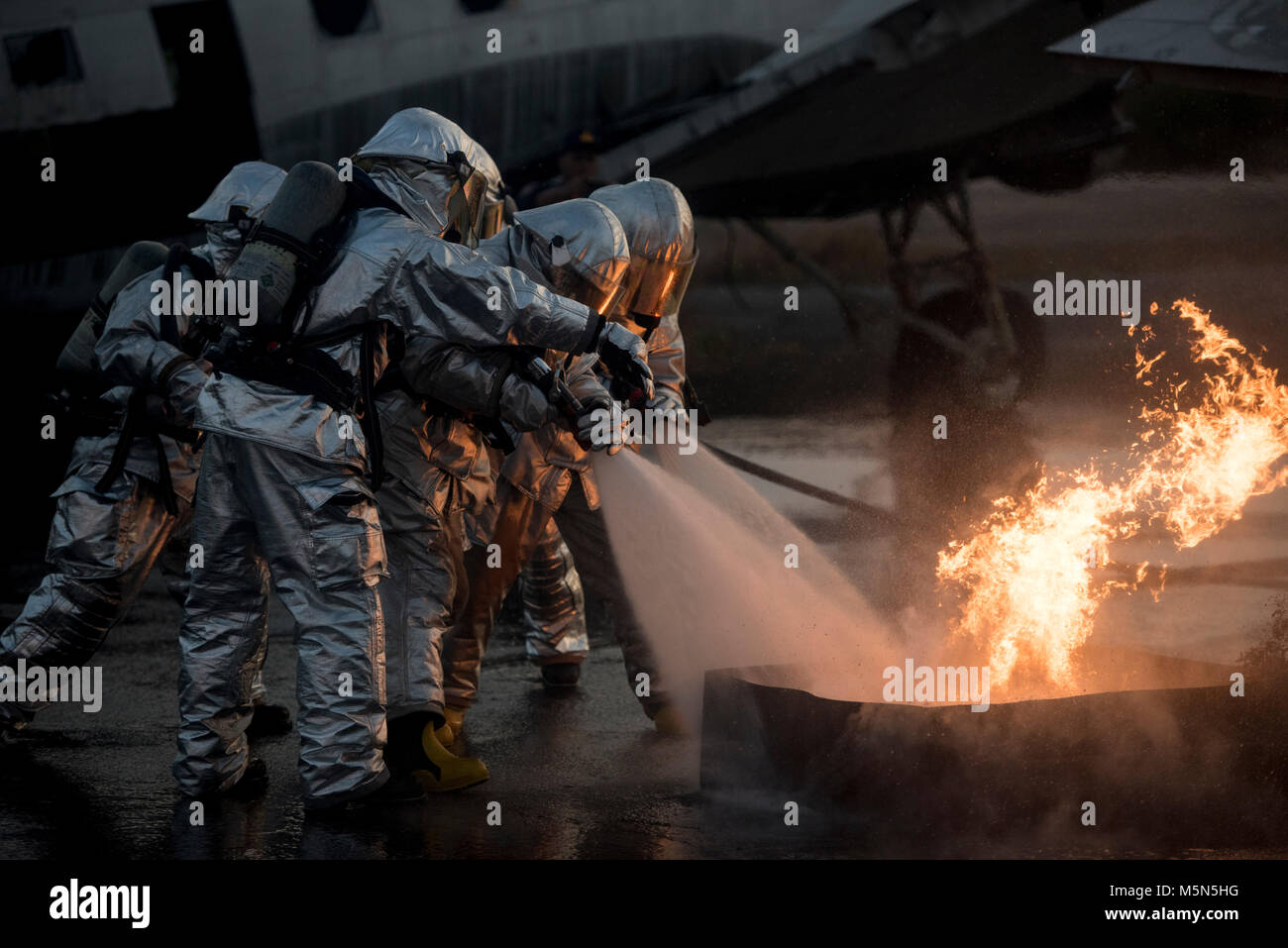 U.S. Marine Corps firefighters from Marine Wing Support Squadron 172 ...