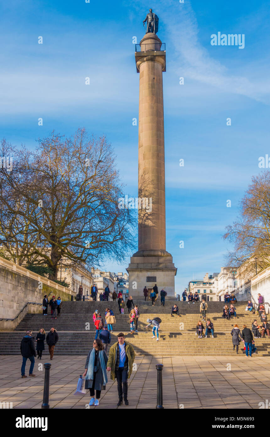 Sunlit, historic Duke of York Column and steps beneath, with many ...