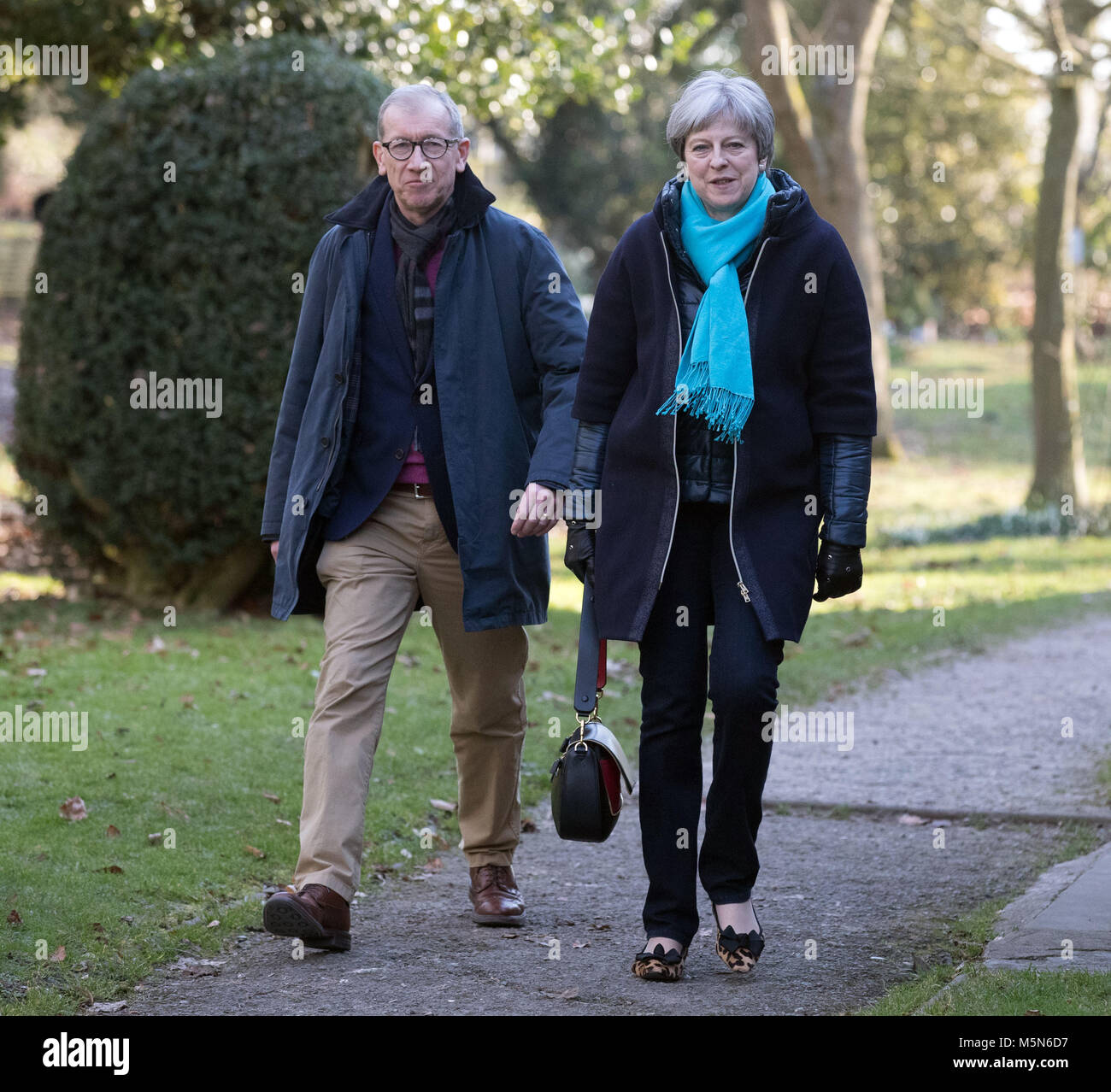 Prime Minister Theresa May and her husband Philip leave after attending ...