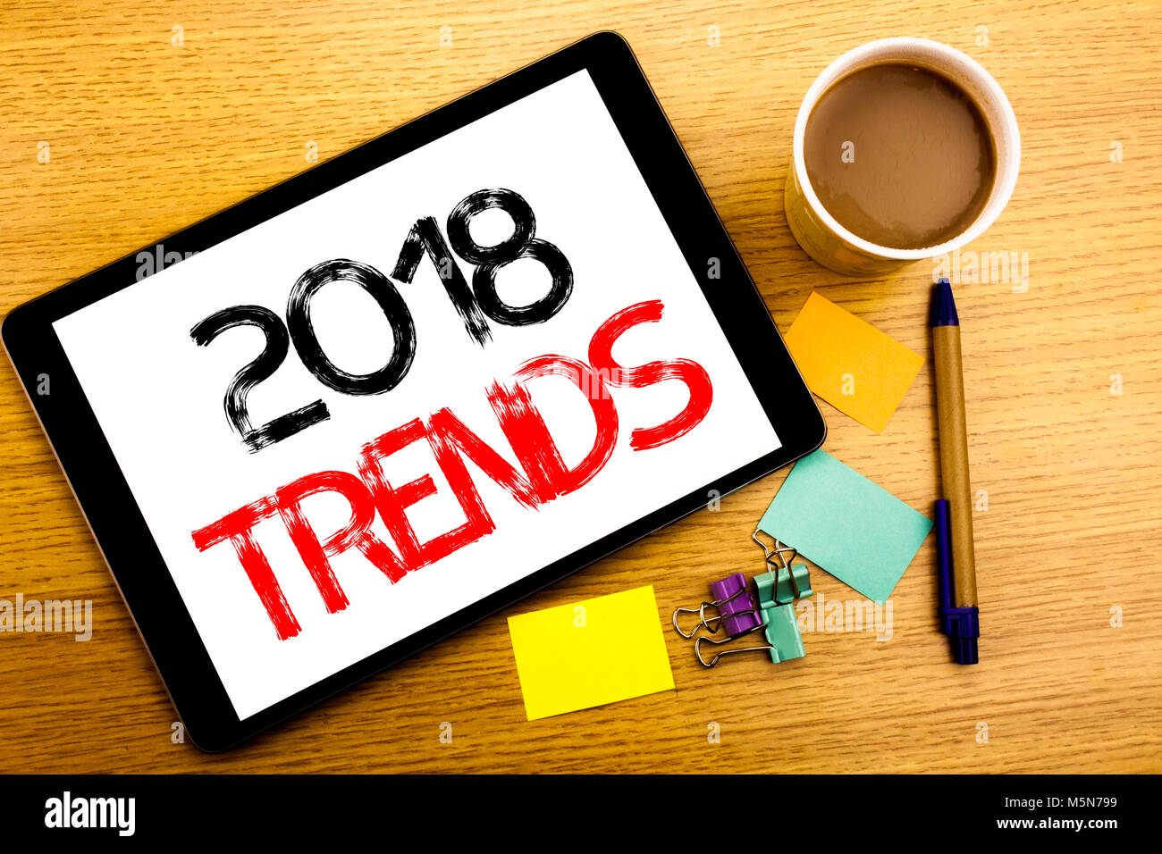 Handwritten text caption showing 2018 Trends. Business concept writing ...