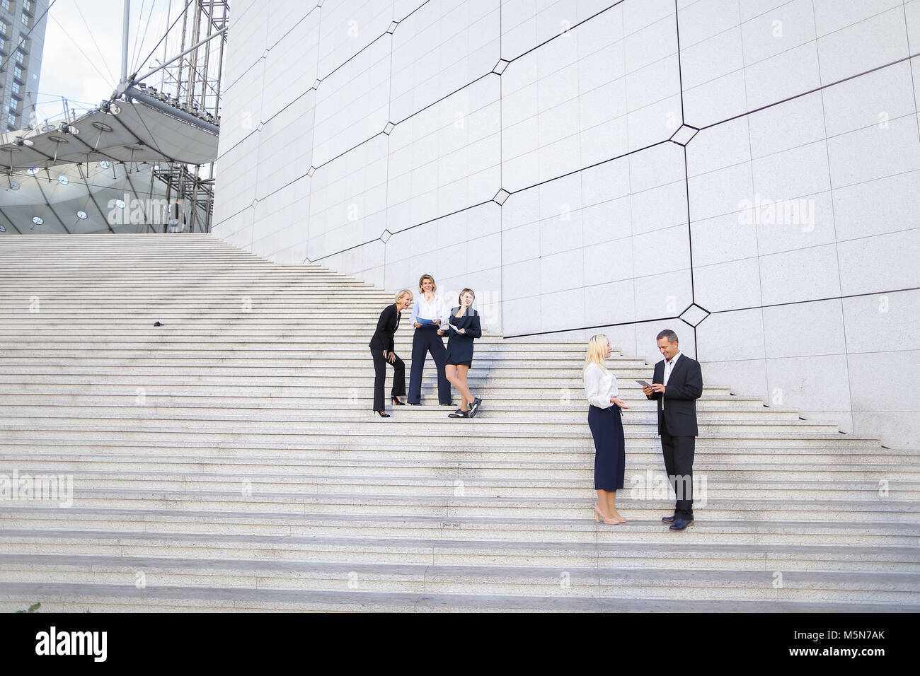 Foreign business colleagues in official journey talking and keep Stock ...