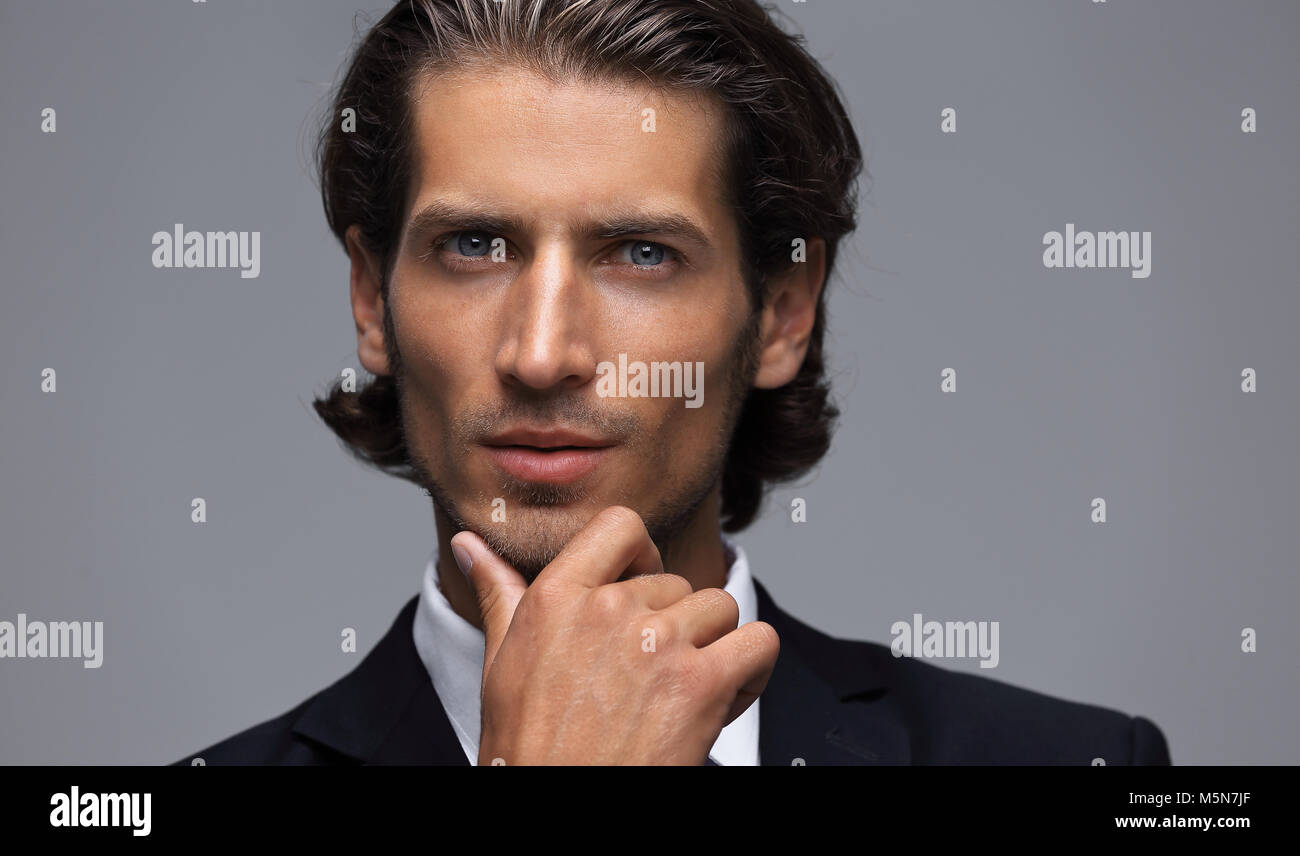 face of confident young businessman Stock Photo - Alamy