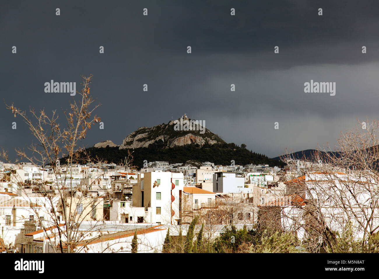 A view of Athens city in a dramatic sky in Greece Stock Photo - Alamy