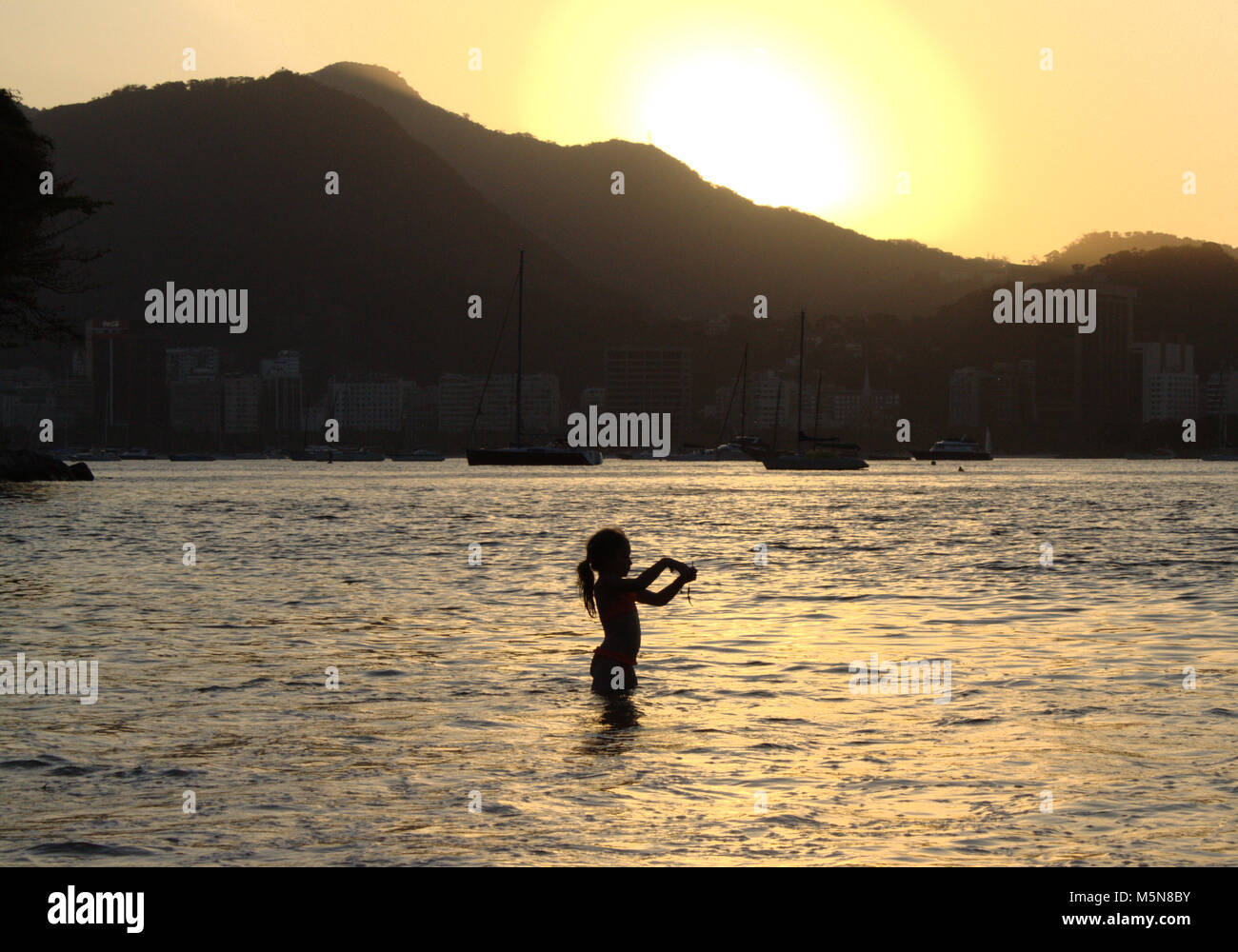 Evening bathing in Rio de Janeiro, Brazil Stock Photo - Alamy