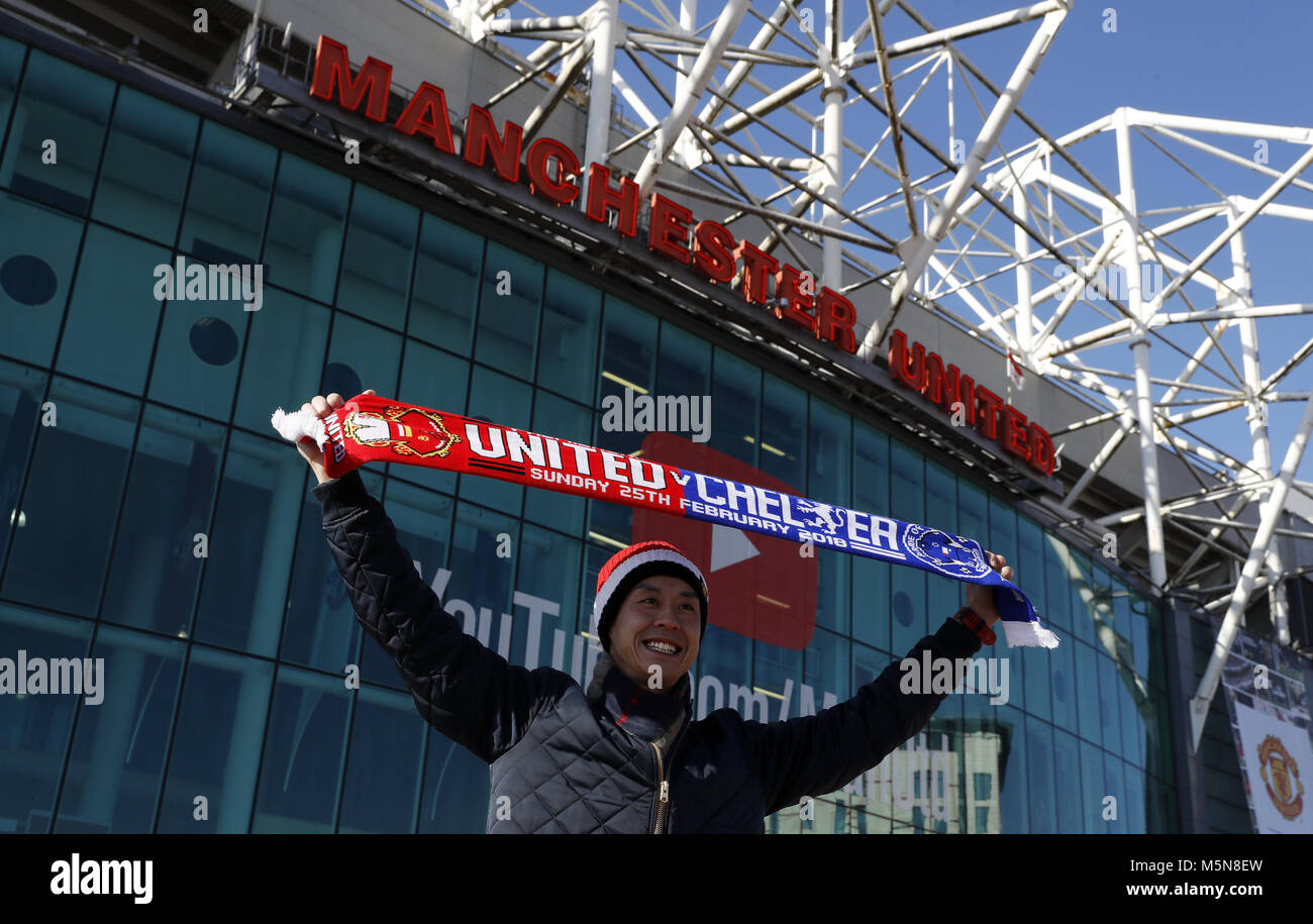 A fan outside the ground before the Premier League match at Old ...