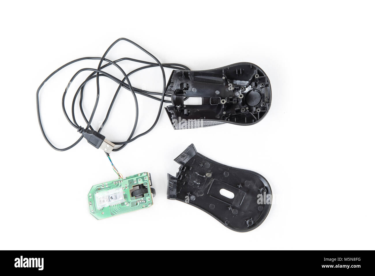 Dismantled computer mouse with USB cable on the white Stock Photo - Alamy