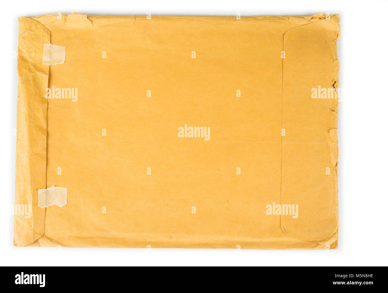 Old vintage orange crumpled envelope on white Stock Photo - Alamy