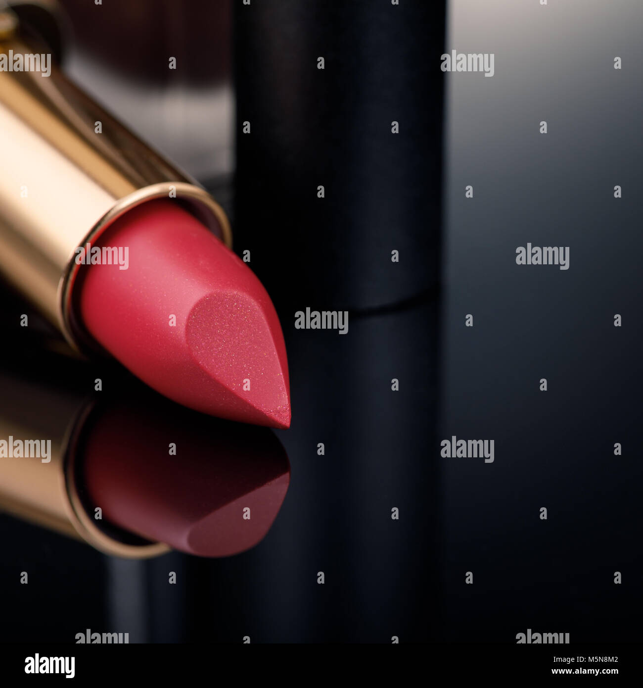 Fashion Colorful Lipsticks over black background with space for text ...