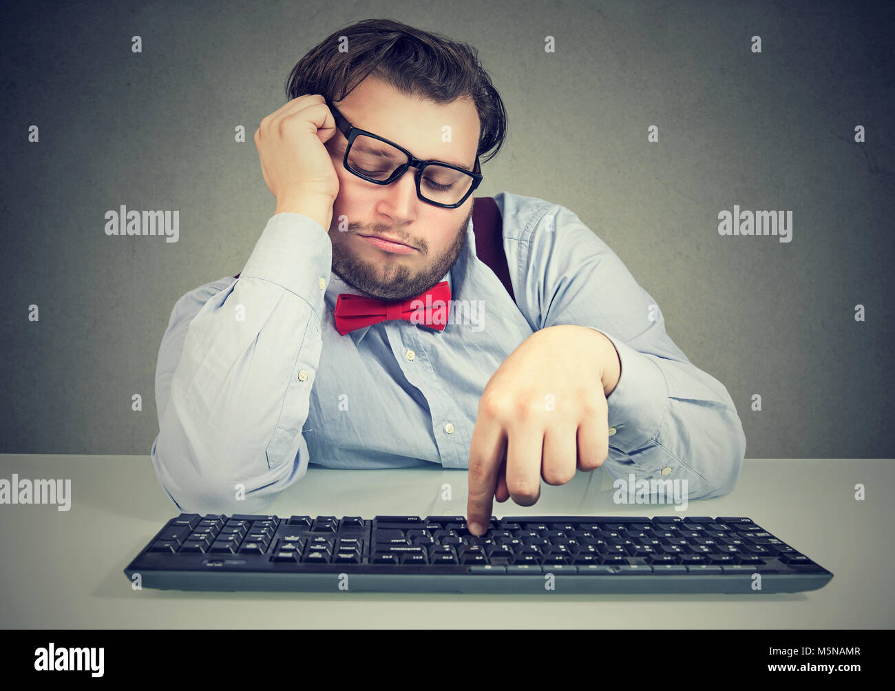 Man computer typing unhappy hi-res stock photography and images - Alamy