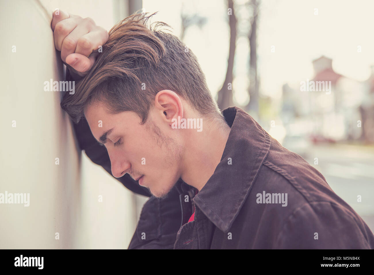portrait stressed sad young woman outdoors. City urban life style ...