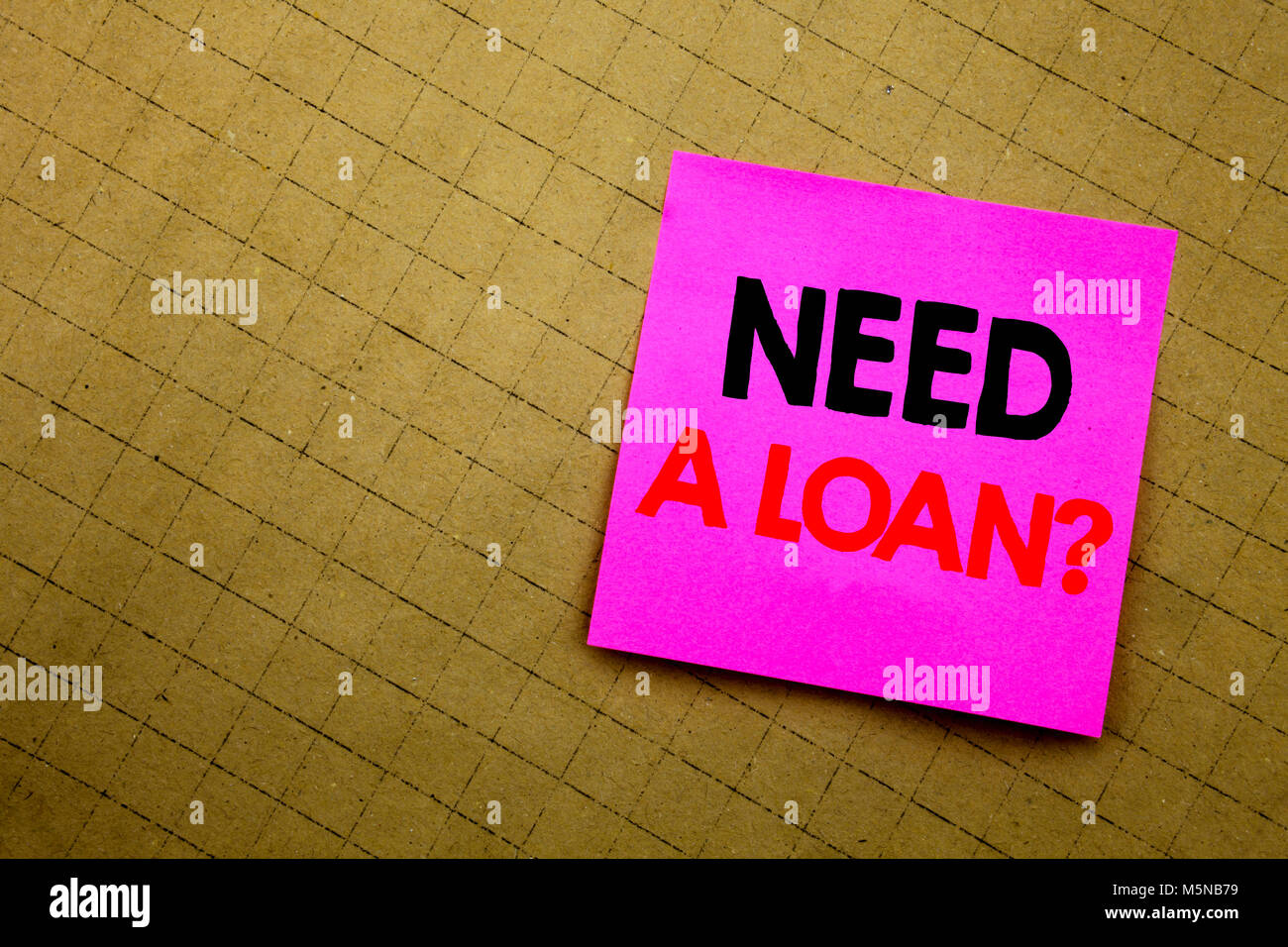 Handwritten text caption showing Need A Loan Question. Business concept ...