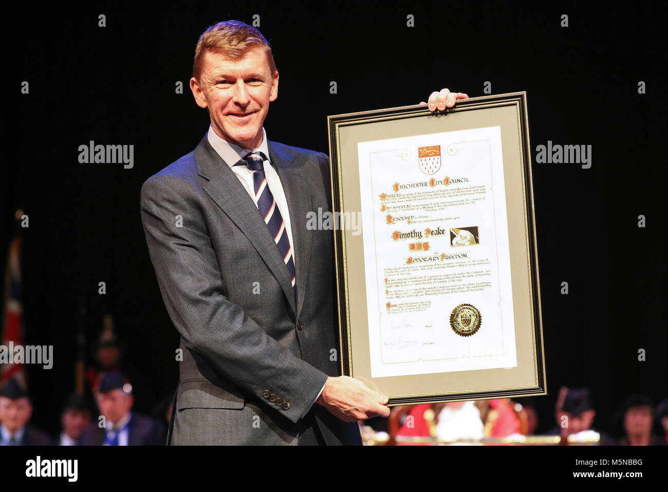 Tim Peake poses with an Honorary Freedom certificate after a ceremony ...