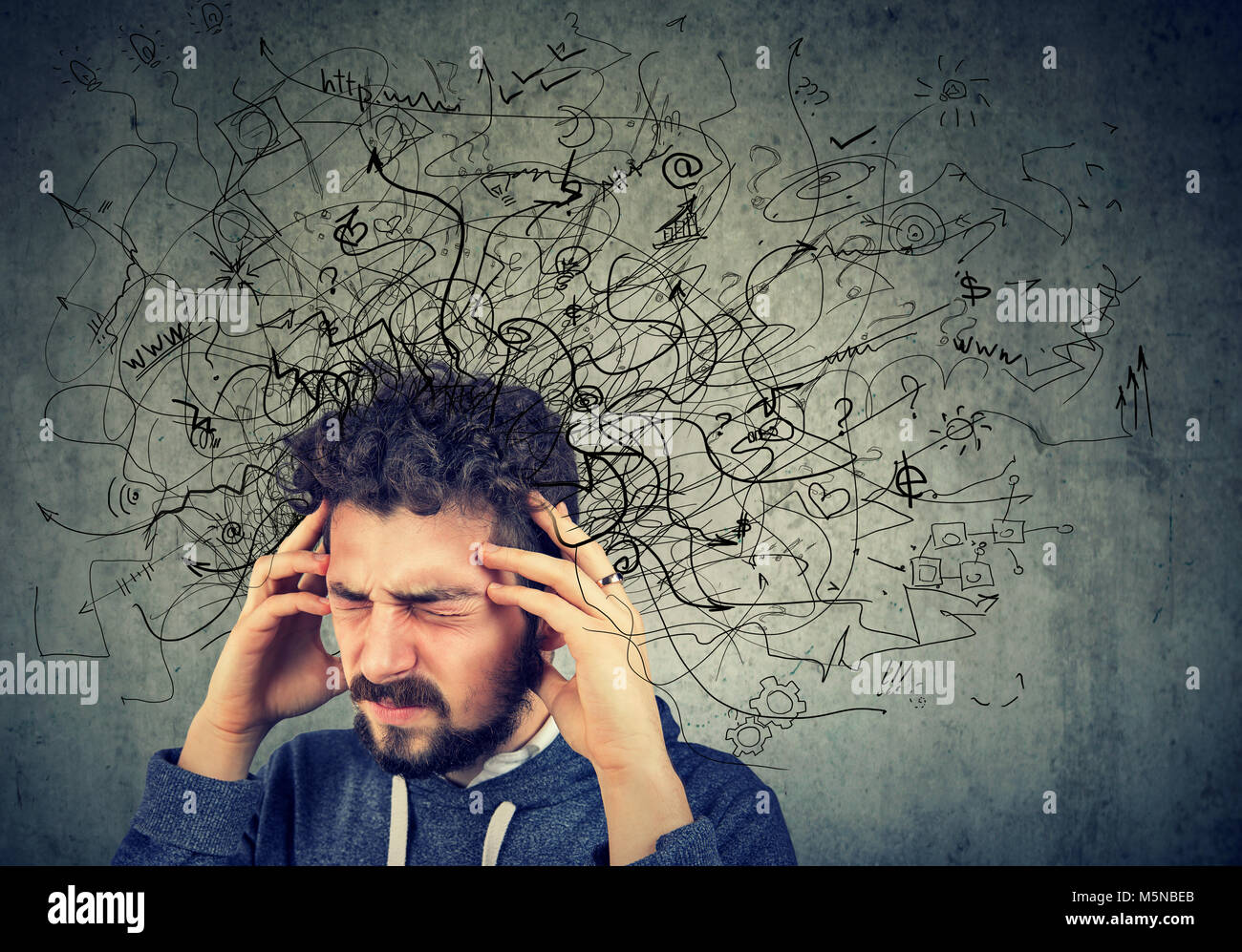 Thoughtful stressed young man with a mess in his head Stock Photo - Alamy