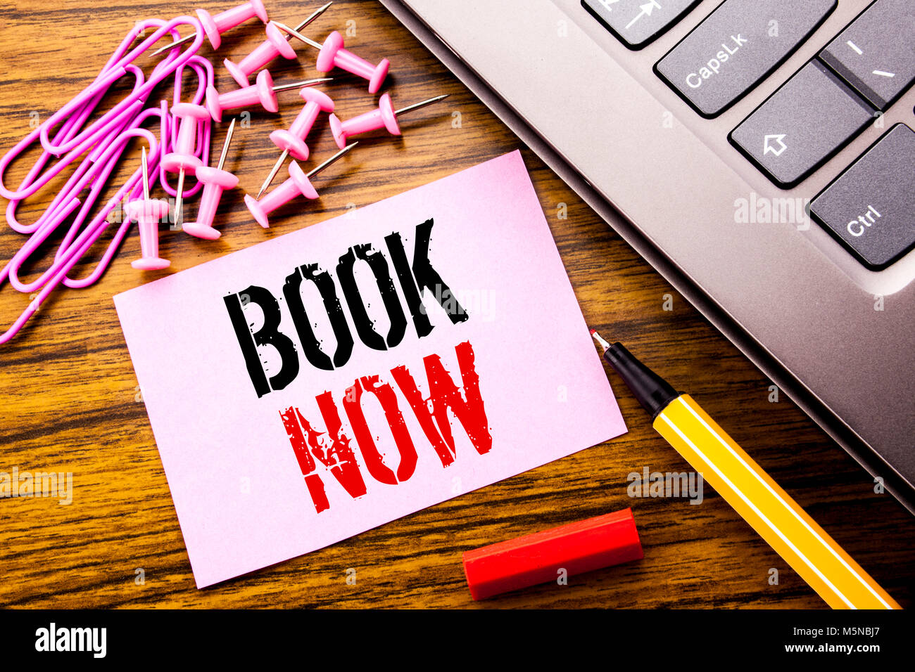 Handwritten text showing Book Now. Business concept for Reservation Buy ...