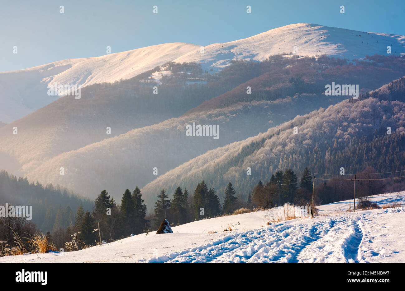 wonderful winter landscape in mountains. beautiful countryside with ...