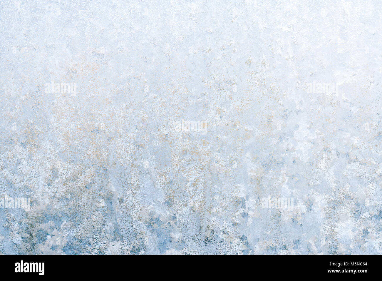Winter frosty patterns on the frozen ice window Stock Photo - Alamy