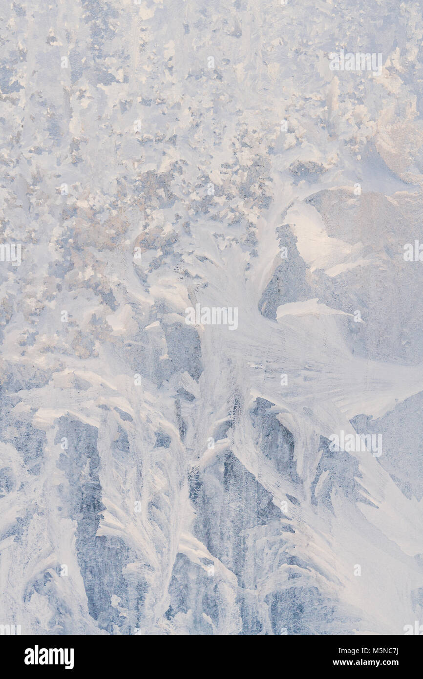 Winter frosty patterns on the frozen ice window Stock Photo - Alamy