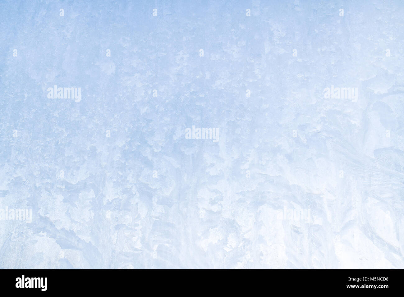 Winter frosty patterns on the frozen ice window Stock Photo - Alamy