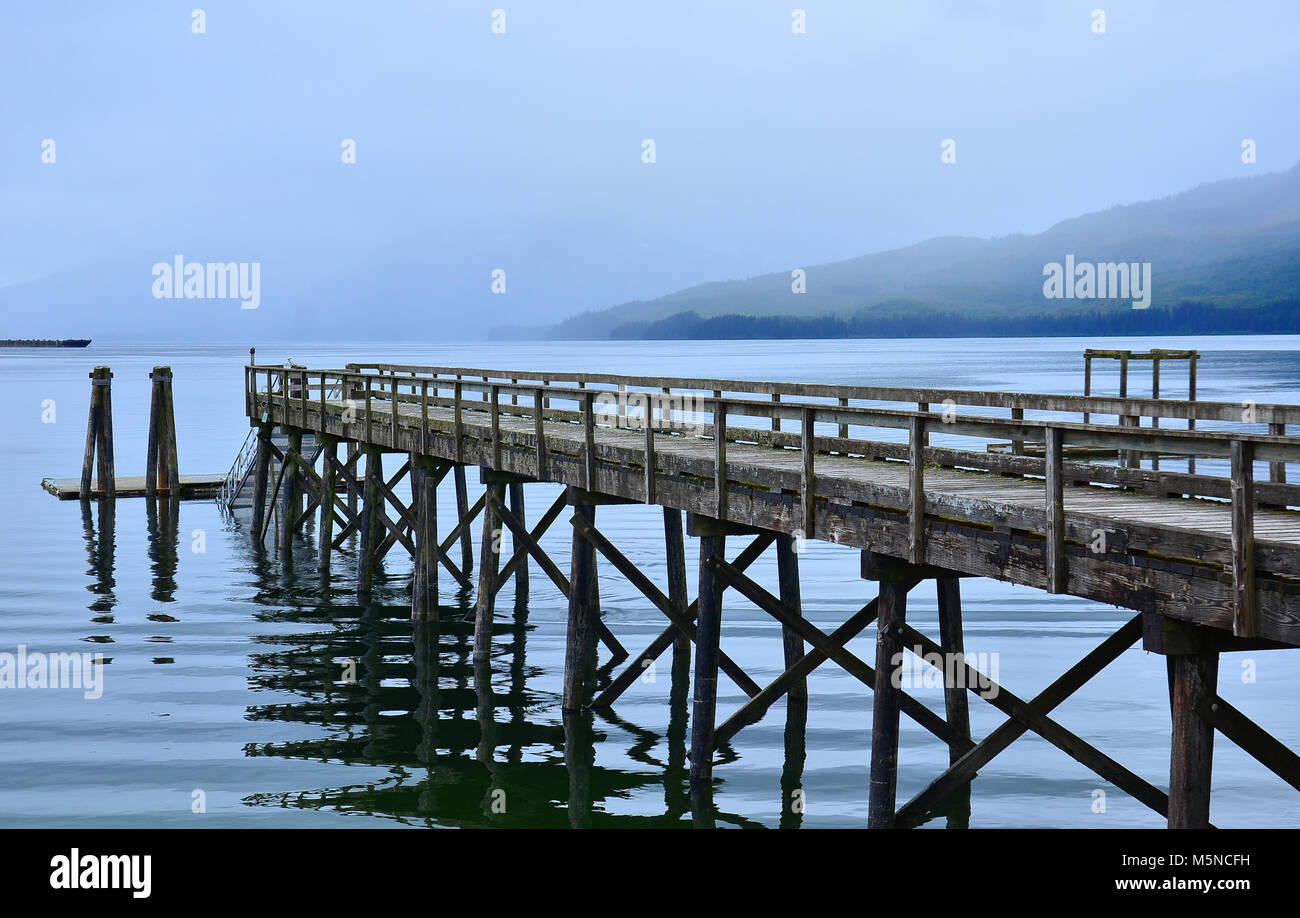 Wooden pier bridge monochrome blue landscape in Alaska Stock Photo - Alamy