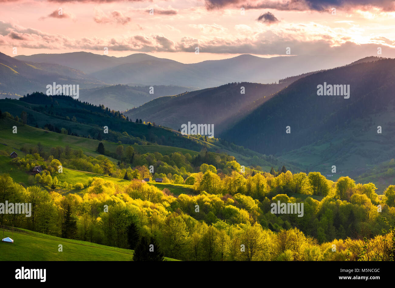 gorgeous mountainous countryside at sunset. beautiful landscape with ...