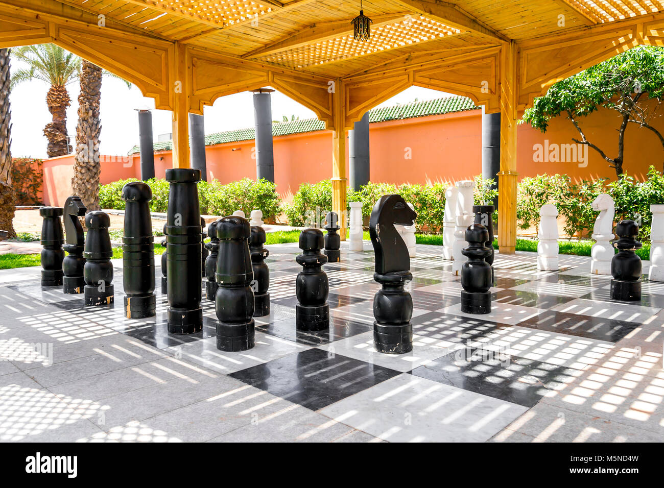 Giant chess pieces surrounded by a garden Stock Photo - Alamy