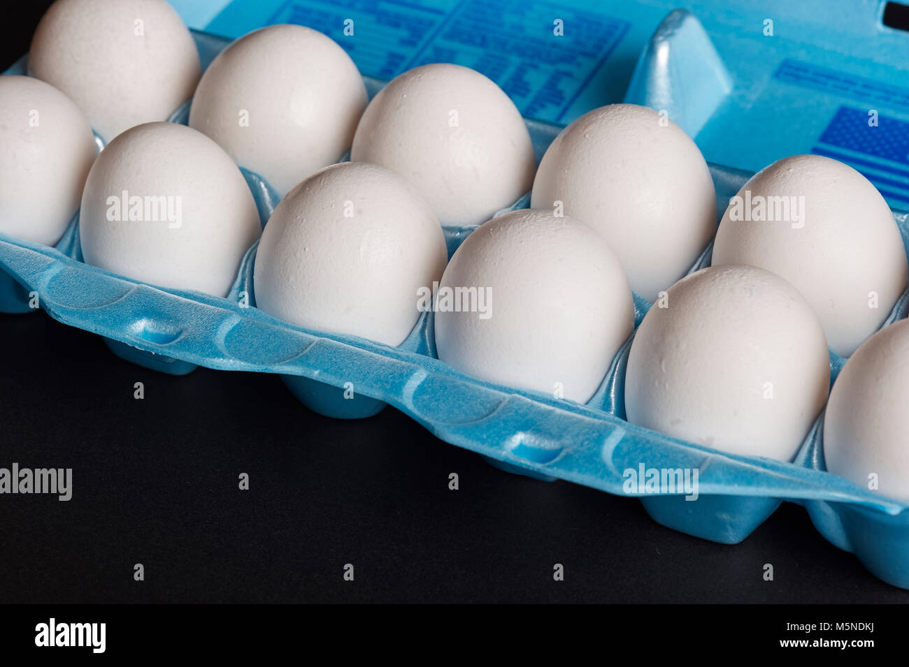 One dozen Grade A extra large white eggs in carton Stock Photo - Alamy