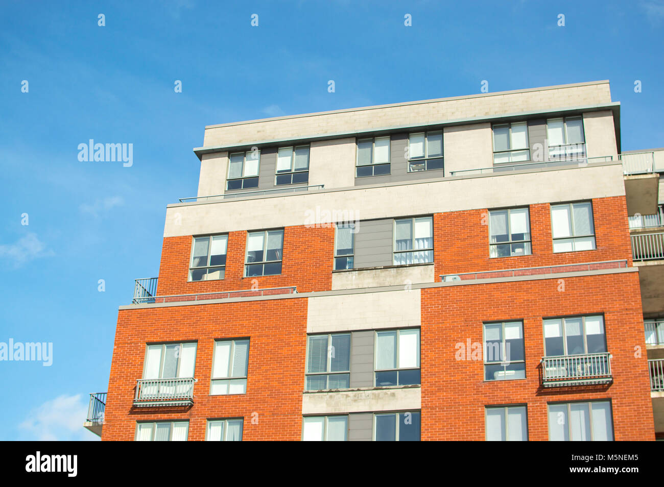Modern condo buildings with huge windows and balconies in Montreal ...