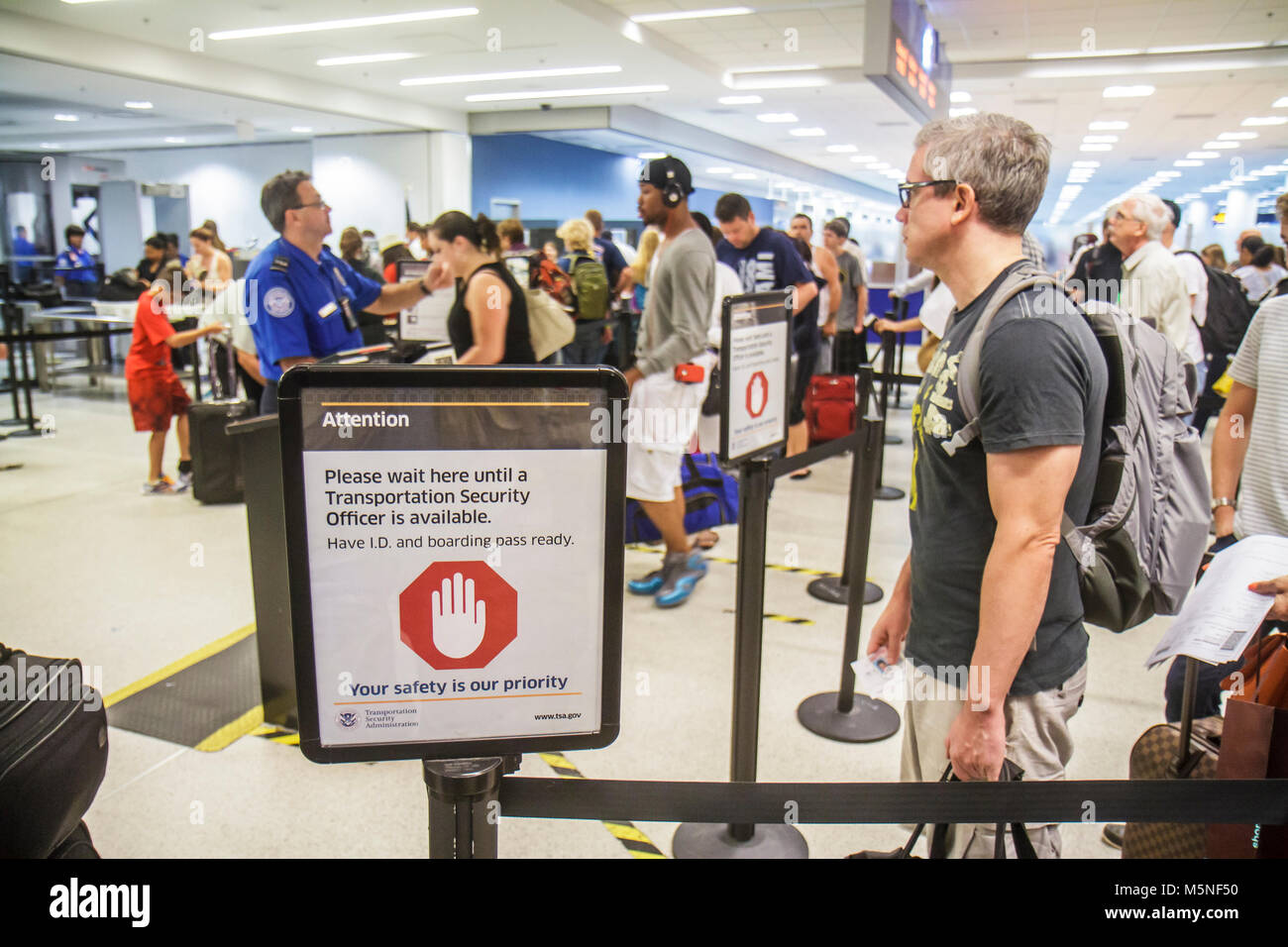 Tsa screening of a man hi-res stock photography and images - Alamy