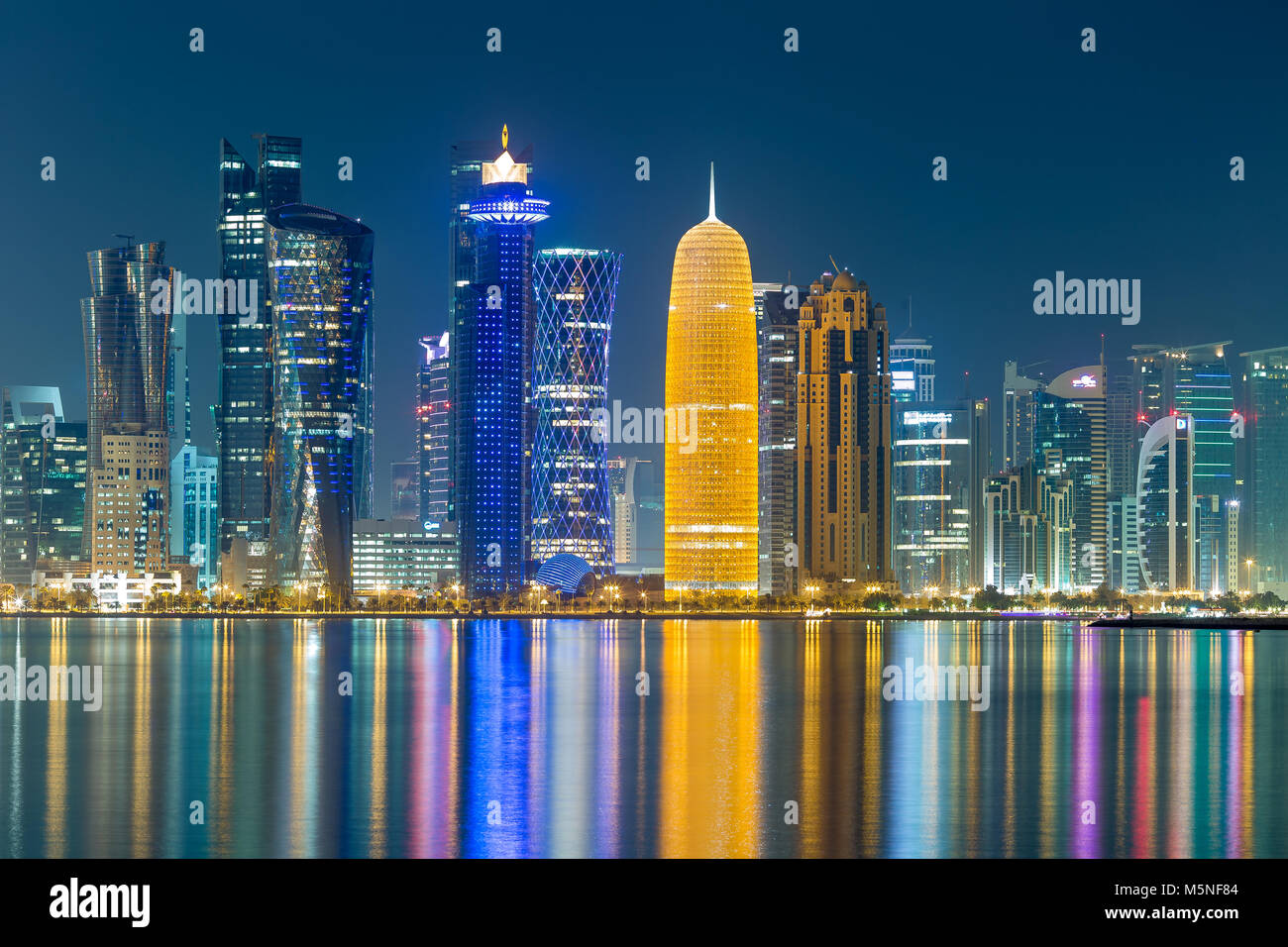the towers of Doha cornice at night Stock Photo - Alamy