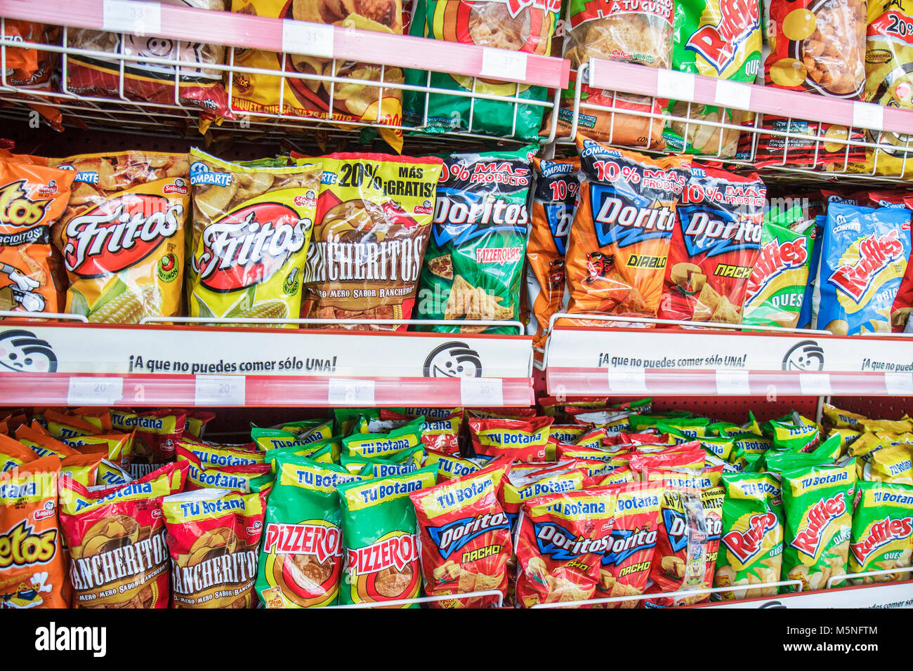 Oxxo convenience store shelves display sale High Resolution Stock ... Oxxo convenience store shelves display sale High Resolution Stock ...
