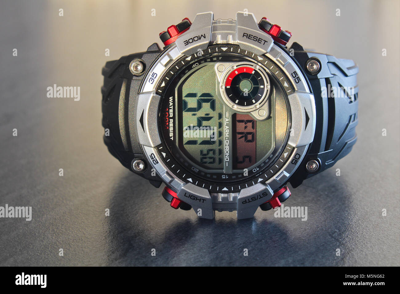Men digital sport hand watch on dark background Stock Photo - Alamy