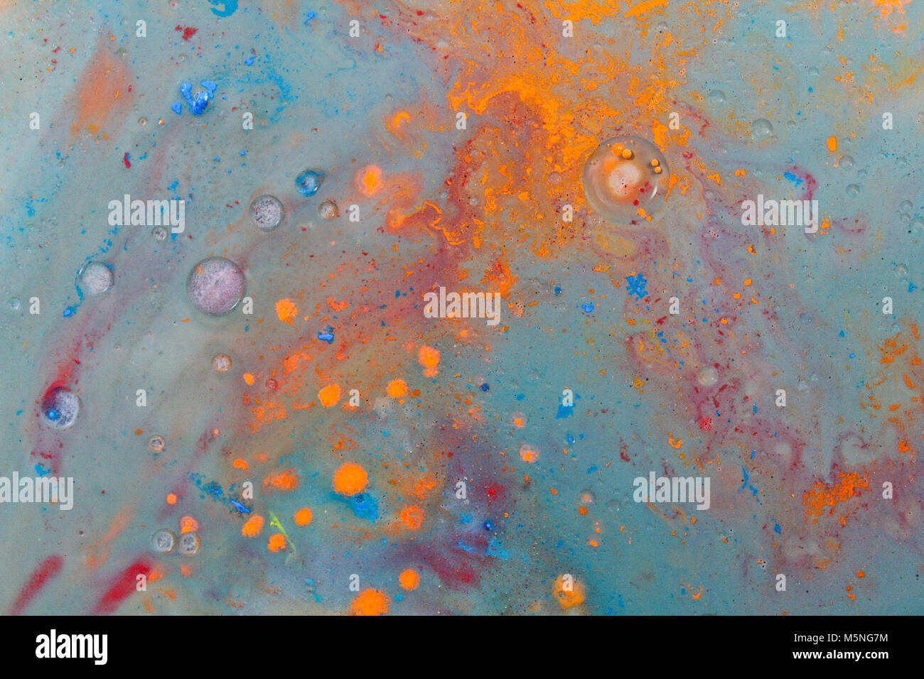 Abstract orange and blue color mix in milk and oil Stock Photo - Alamy