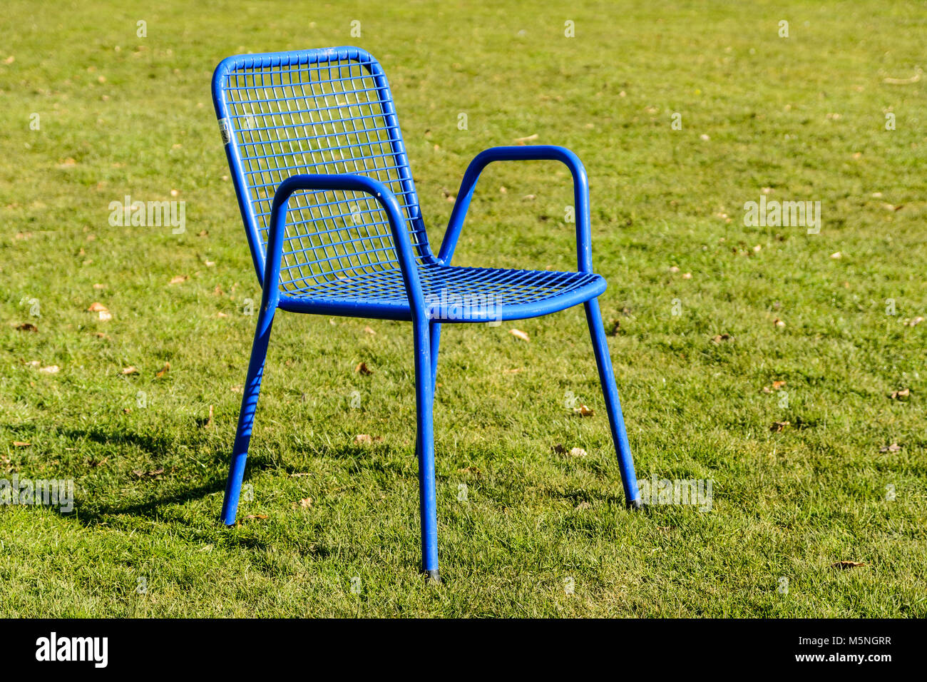 lonesome blue chair Stock Photo - Alamy
