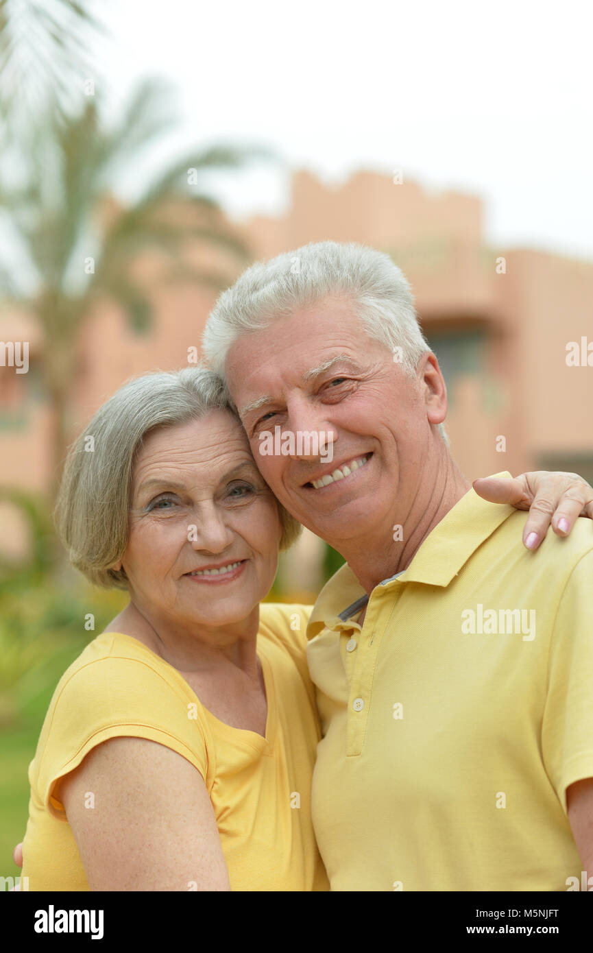 Mature couple hugging near hi-res stock photography and images - Alamy