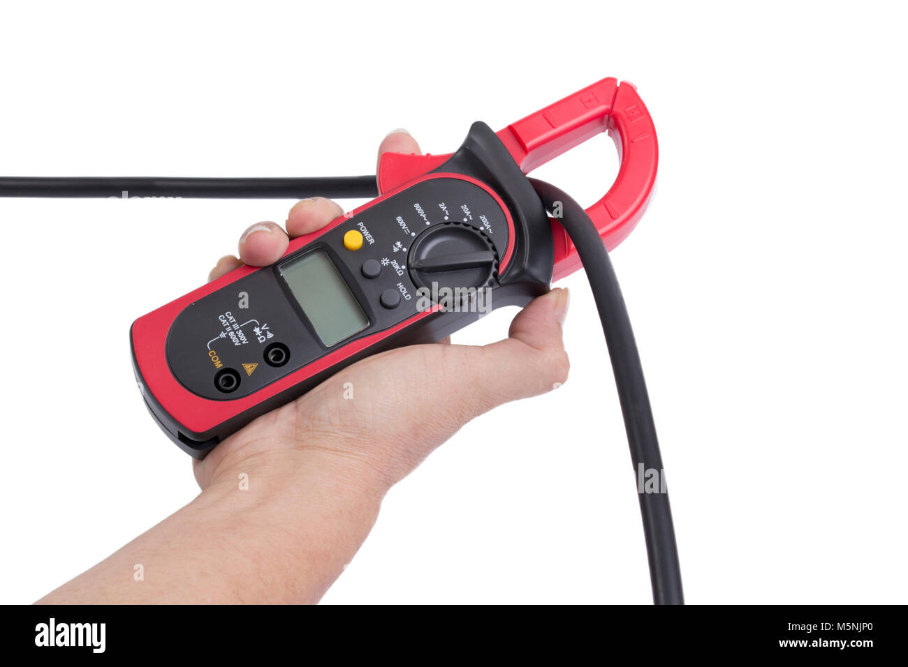Red multimeter clamp in someone hand on white background Stock Photo ...
