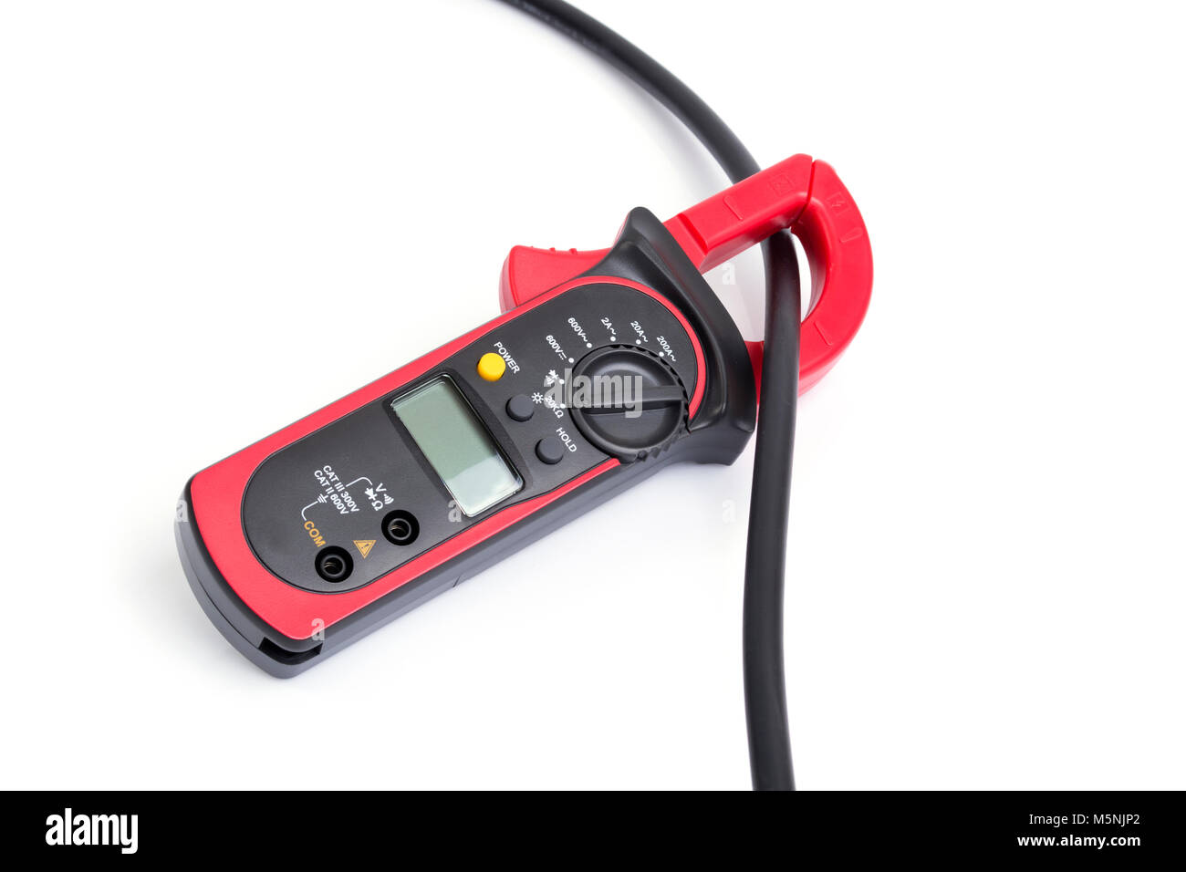 Red multimeter clamp with electricity wire on white background Stock ...