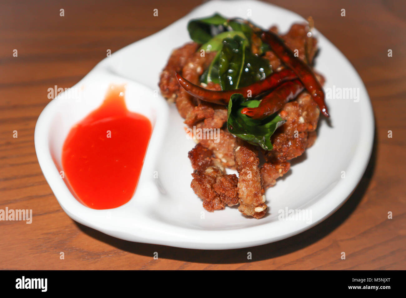 deep fried pork with chili sauce Stock Photo - Alamy