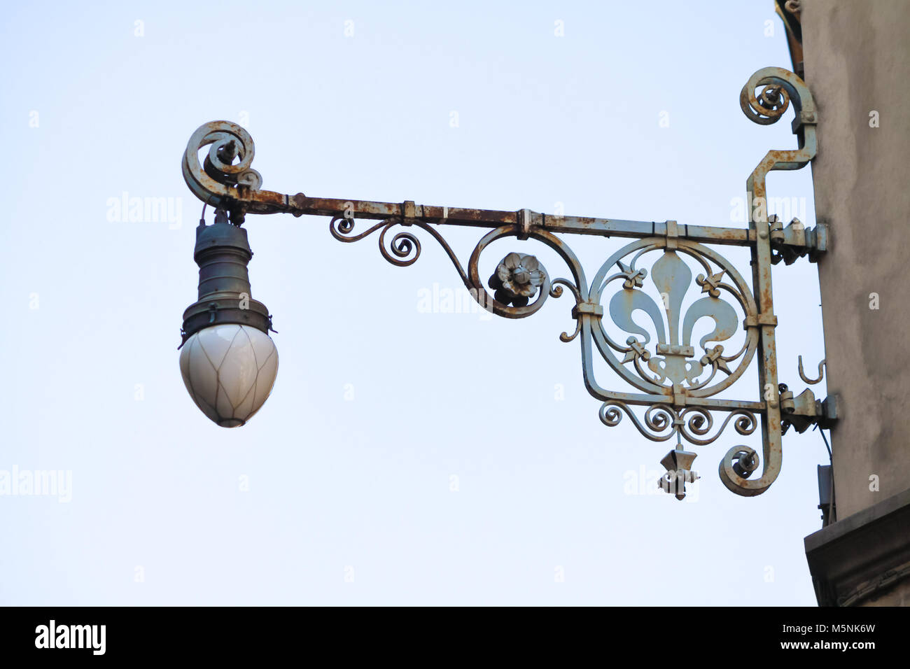 Florence Original lantern with the symbol of the city Stock Photo - Alamy