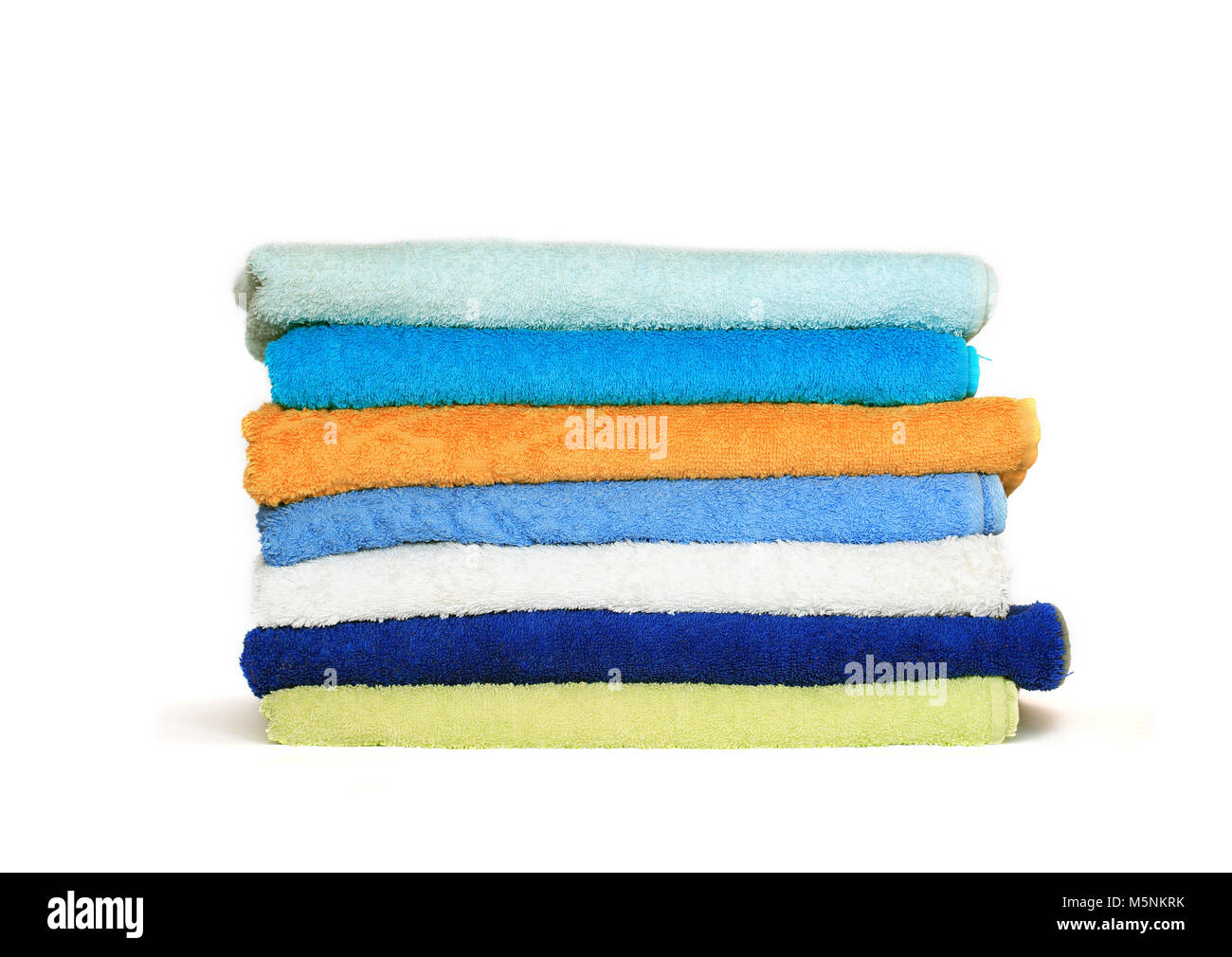 Stack of clean colorful towels isolated on white background Stock Photo ...
