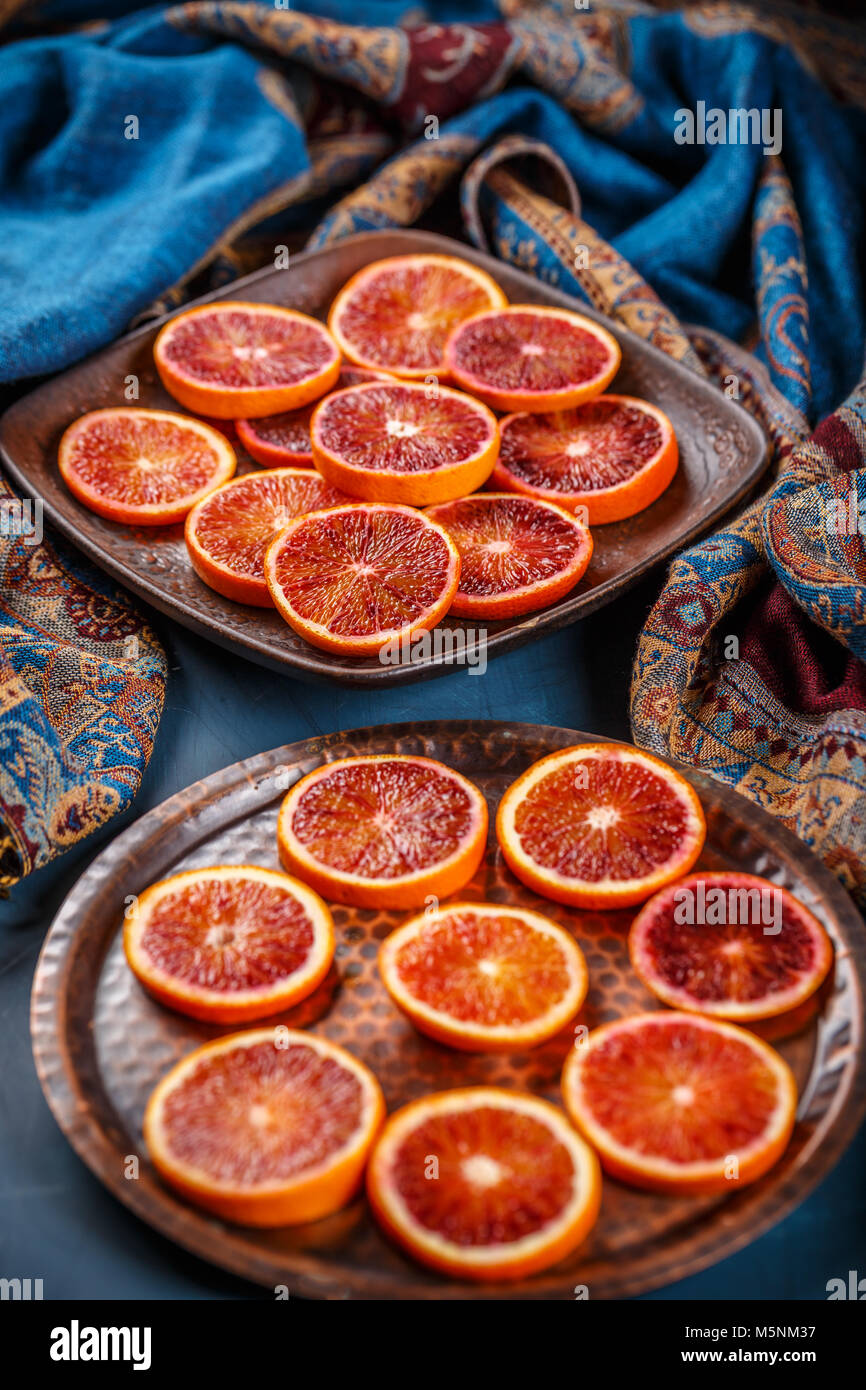 Plate of ruby red blood orange slices Stock Photo - Alamy