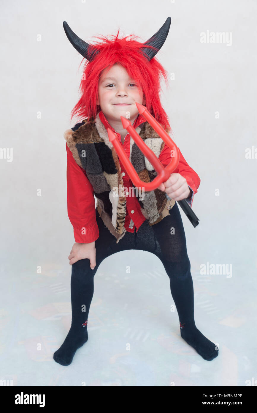 Child boy devil horns trident hi-res stock photography and images - Alamy