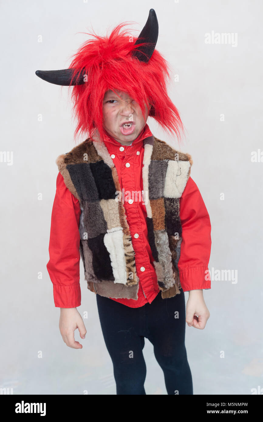 Child boy devil horns trident hi-res stock photography and images - Alamy