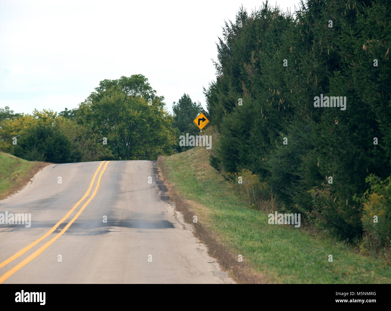 Rural country road on beautiful countryside between the farms Stock ...