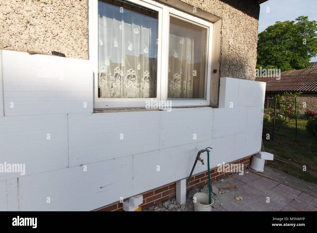 Reconstruction of the old house (insulation facade polystyrene Stock ...