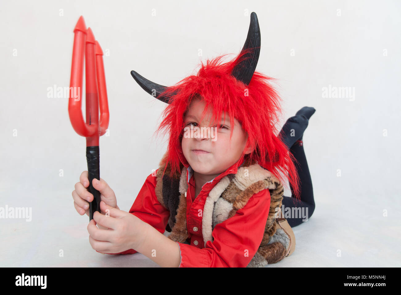 Little boy in devil costume. Halloween party Stock Photo - Alamy