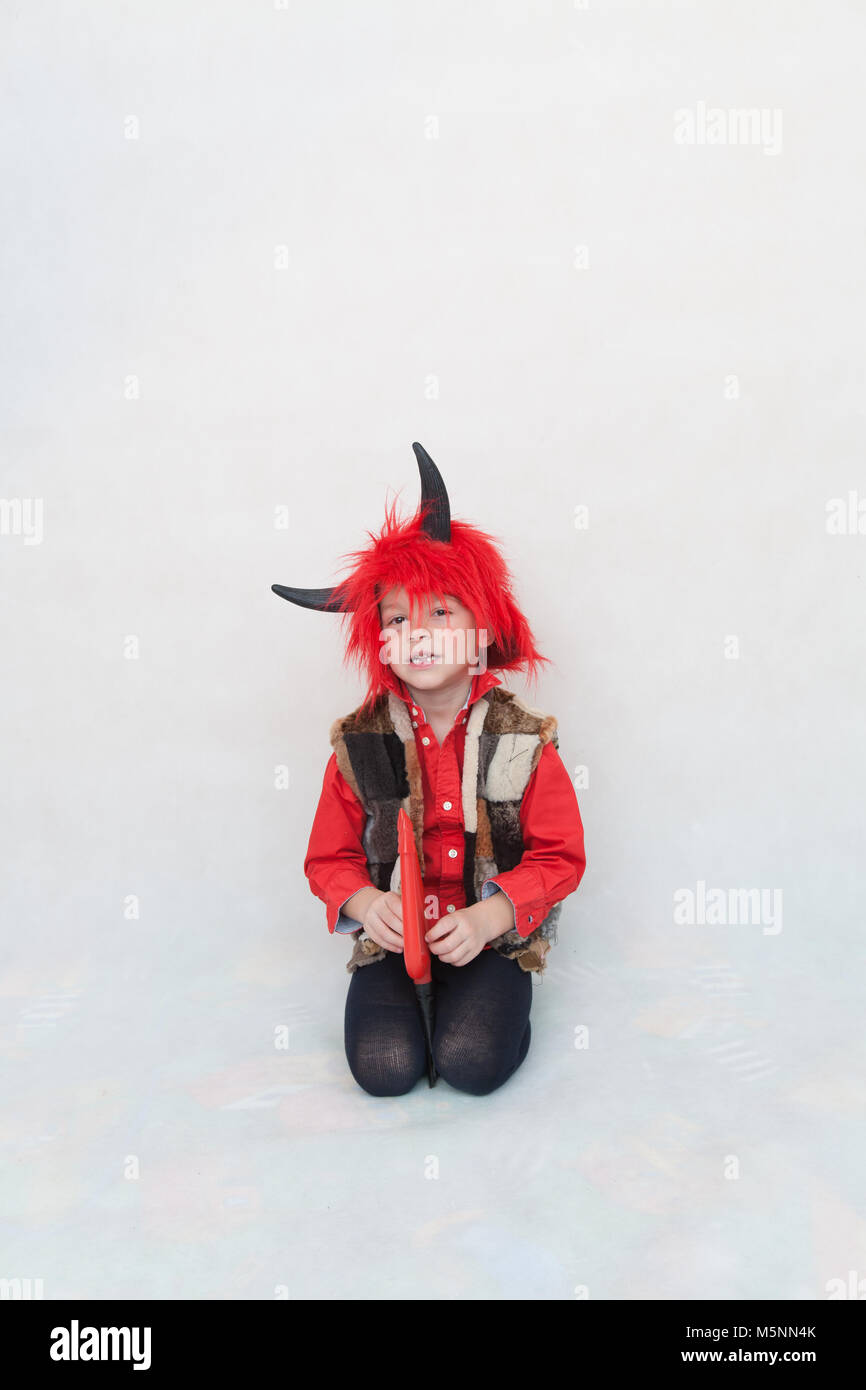 Child boy devil horns trident hi-res stock photography and images - Alamy