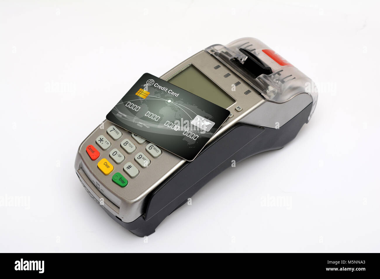 Credit debit card on top of reader machine isolated Stock Photo - Alamy
