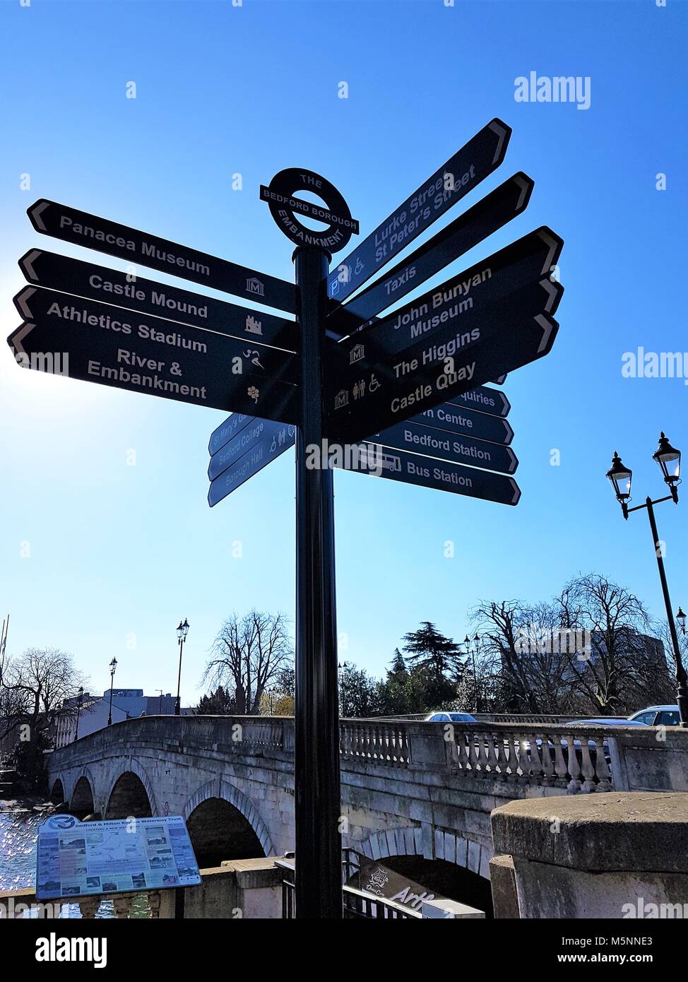 Old style information sign on the riverbank of the River Great Ouse ...