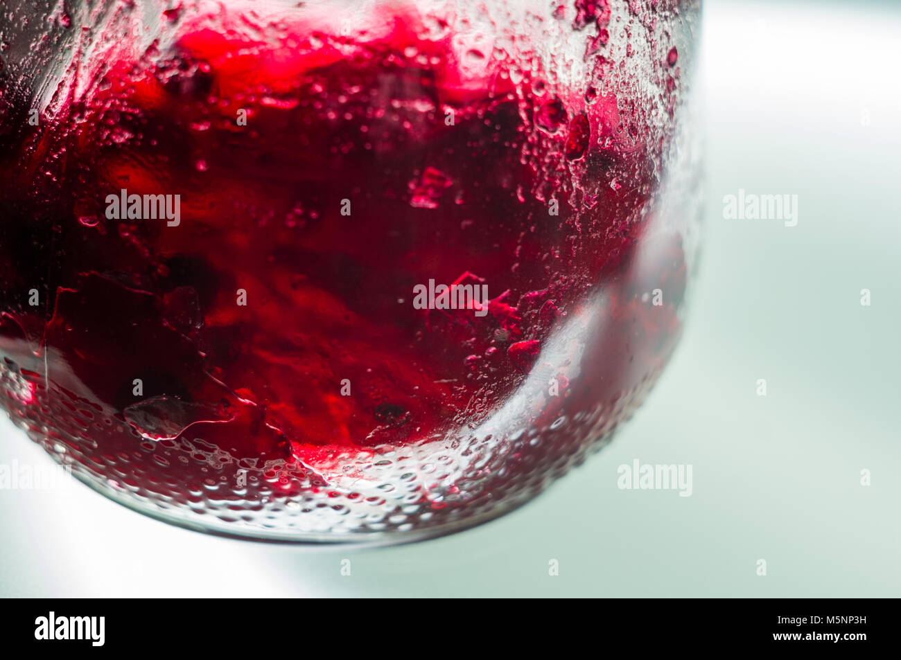 Bright translucent red currant jam in a glass jar Stock Photo - Alamy