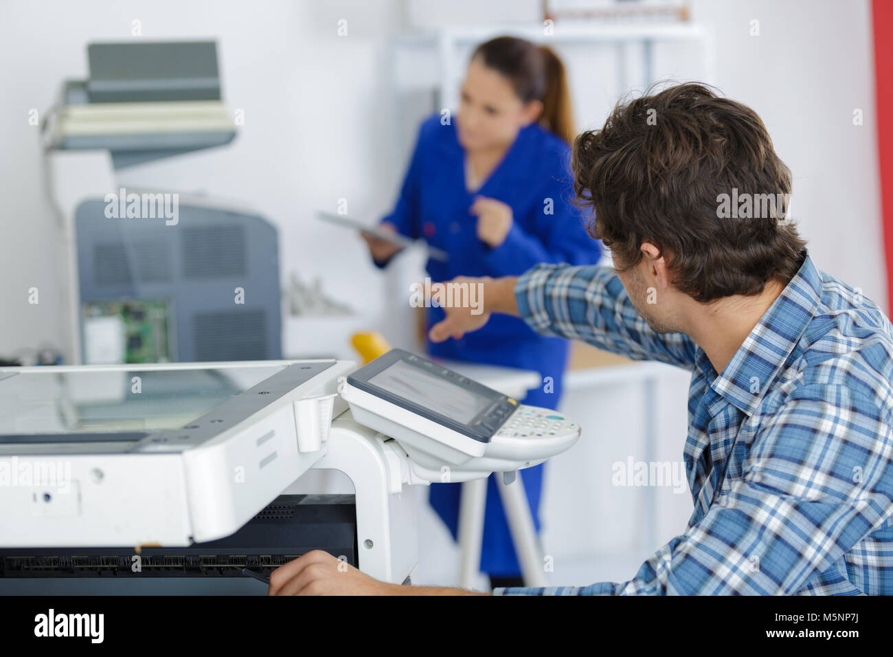 Man fixing printer hi-res stock photography and images - Alamy